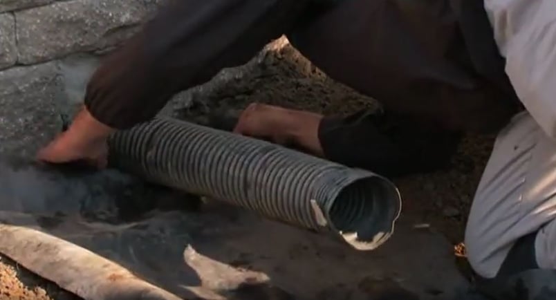 Daylighted Drain Tile in SRW Construction